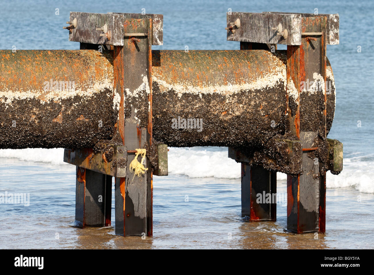 Drain, outflow pipe on the beach in Spring Lake, NJ USA Stock Photo - Alamy
