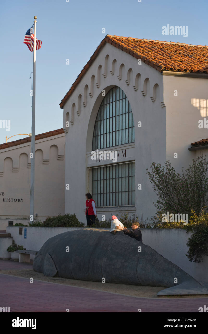 The PACIFIC GROVE NATURAL HISTORY MUSEUM with statue of Califonria grey ...