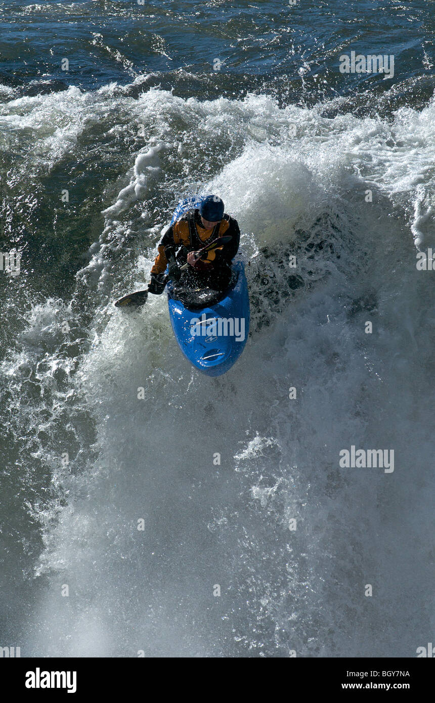 A kayaker drops Steelhead Falls on the Deschutes River Stock Photo - Alamy