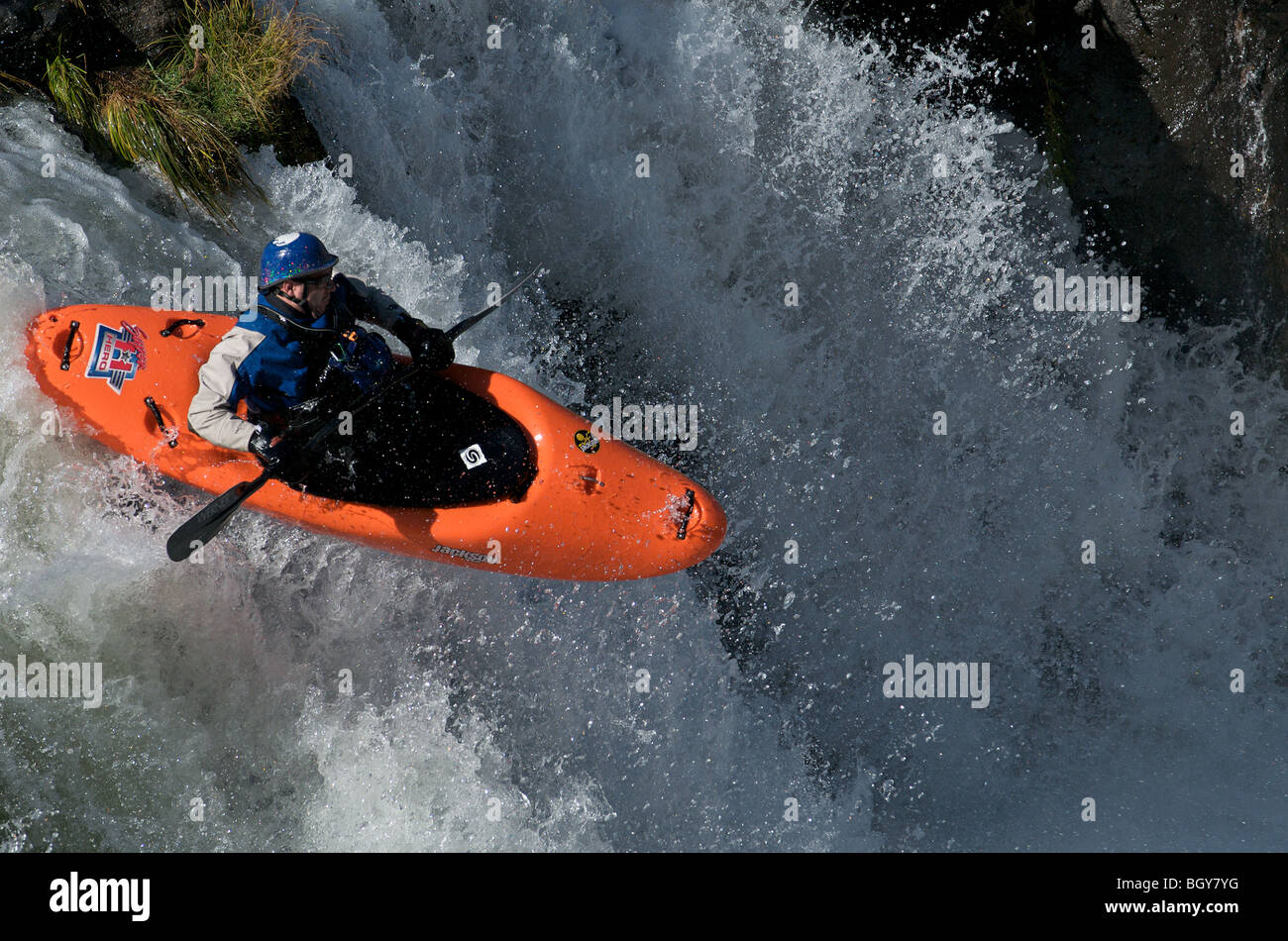 A kayaker drops Steelhead Falls on the Deschutes River Stock Photo - Alamy