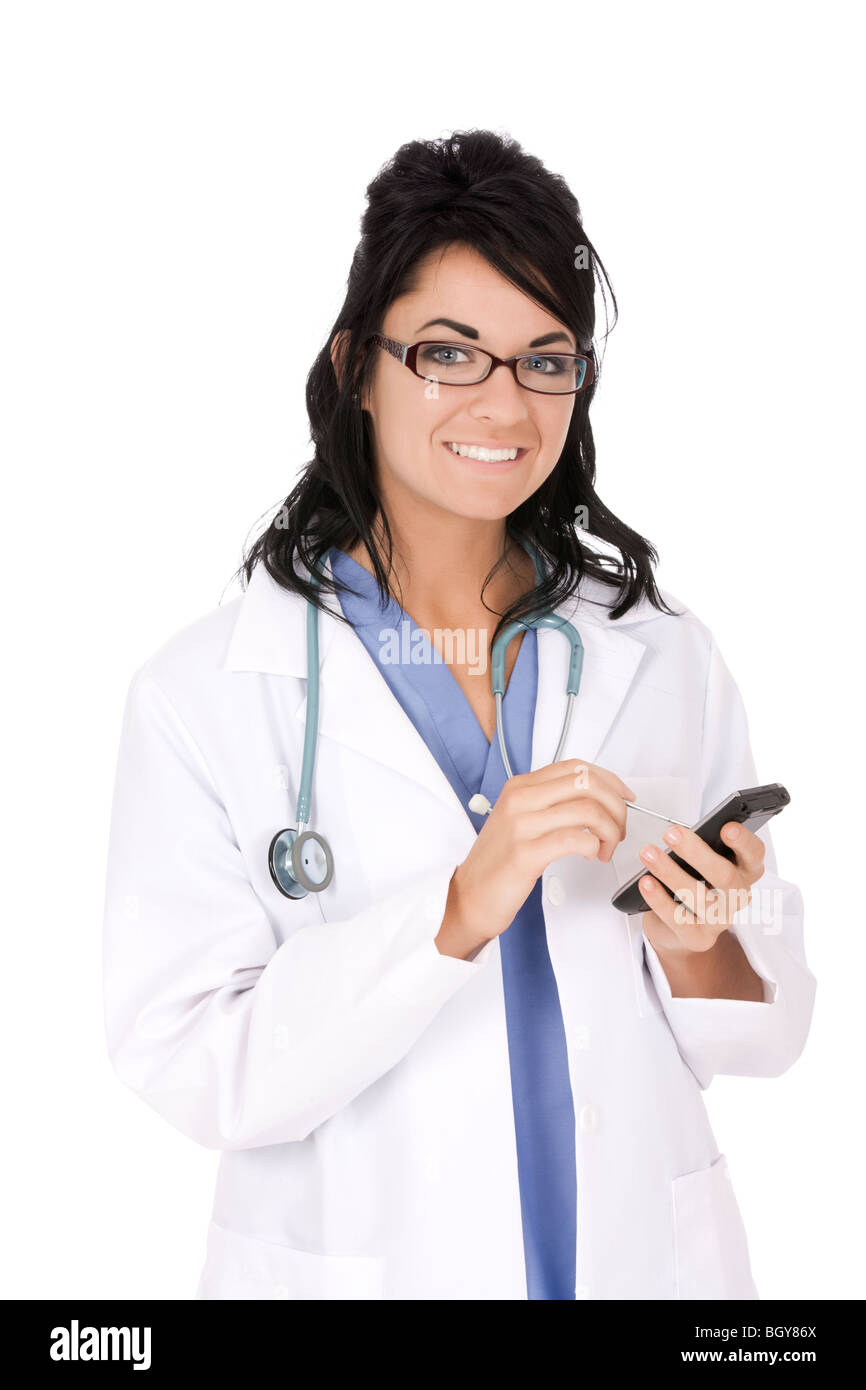 Caucasian woman doctor entering data into a pda on white background Stock Photo - Alamy