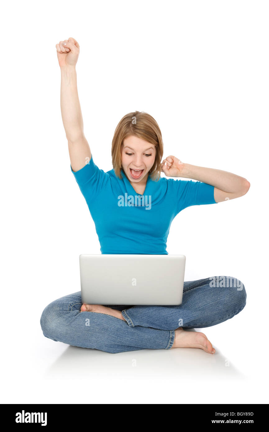 Caucasian teenager working on laptop computer Stock Photo - Alamy