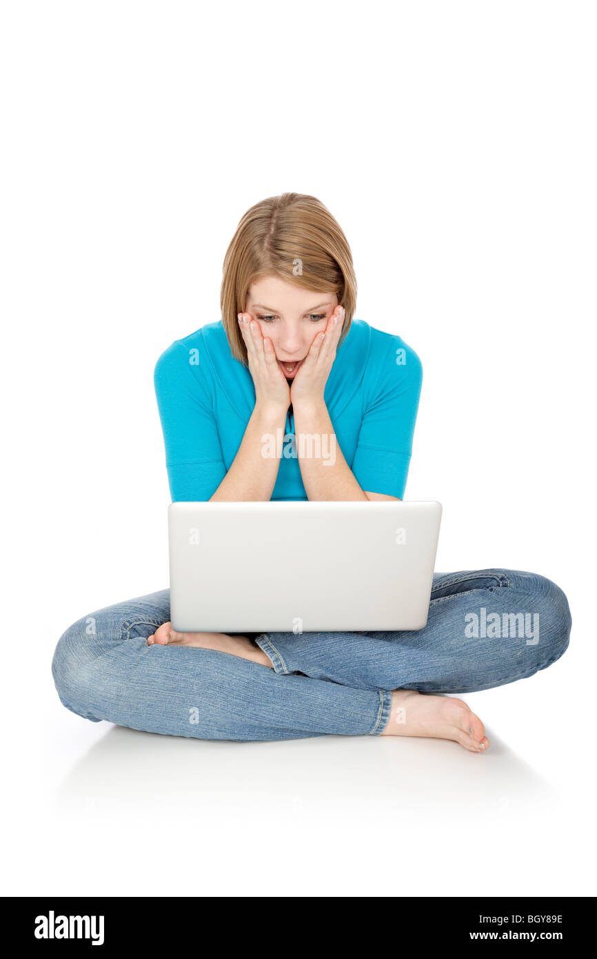 Caucasian teenager working on a laptop computer Stock Photo - Alamy