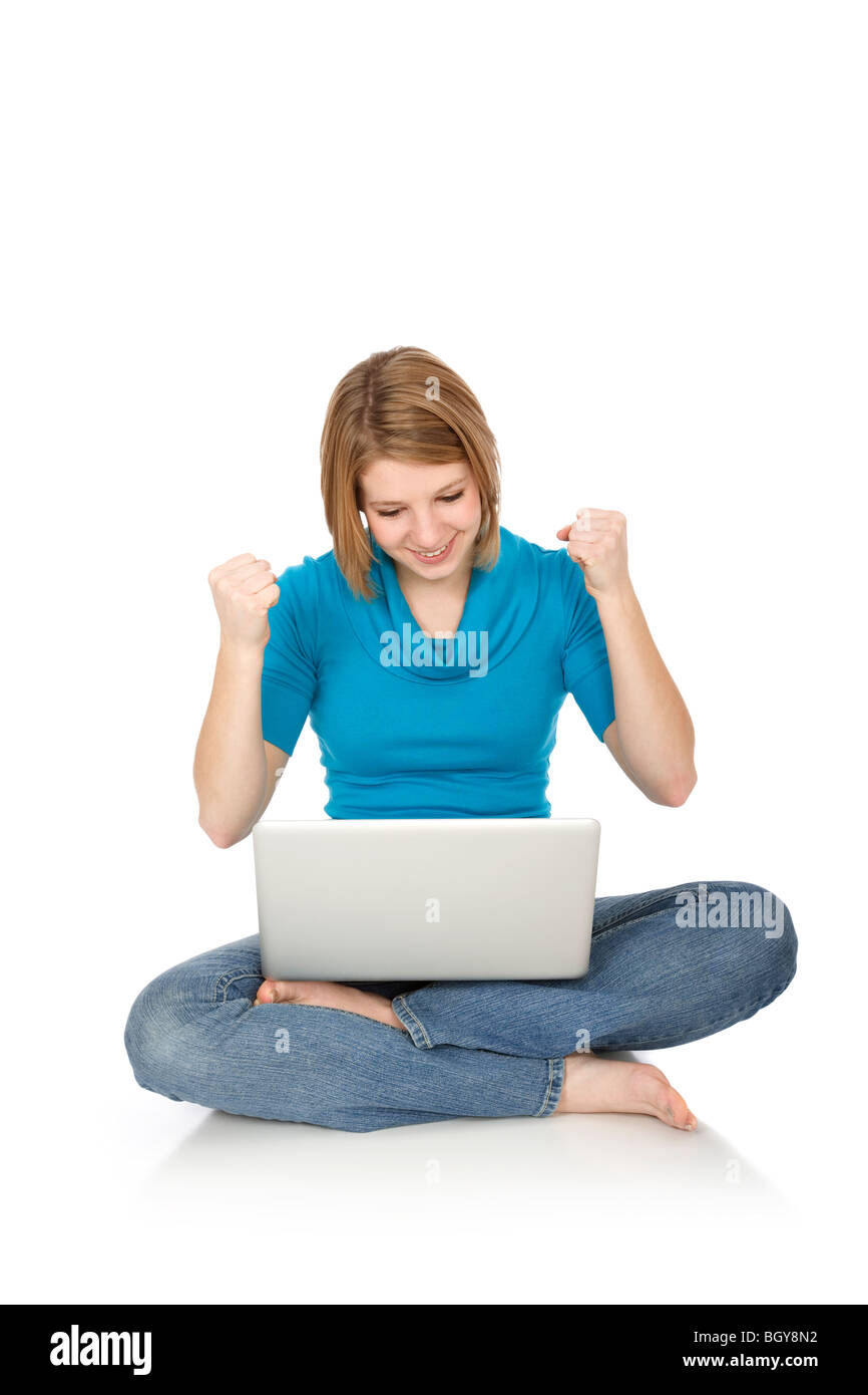Caucasian teenager working on laptop computer Stock Photo - Alamy