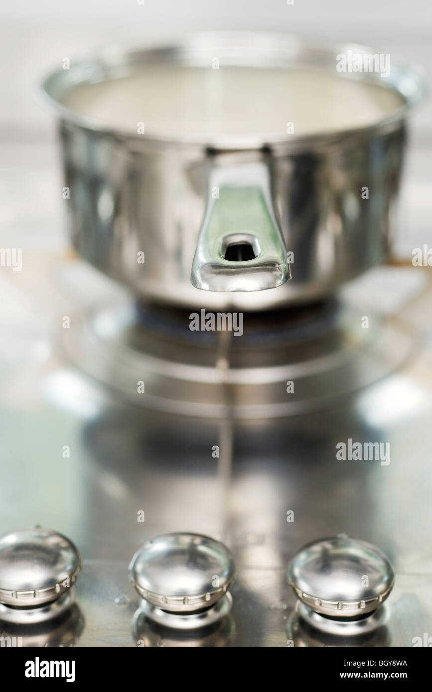 Pot cooking on stove Stock Photo - Alamy