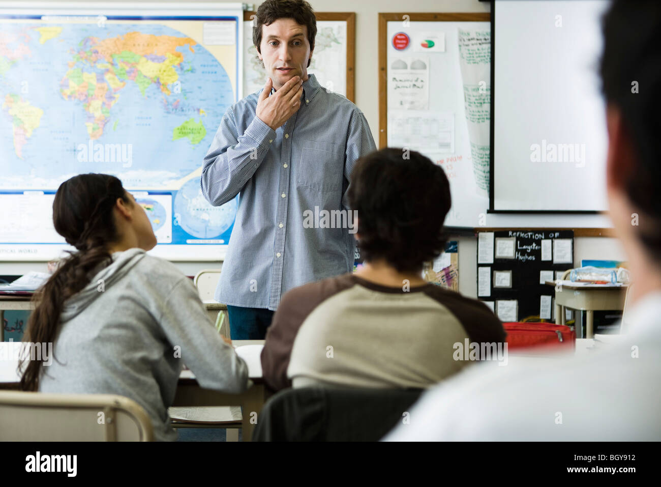 Teacher listening to student's question Stock Photo - Alamy