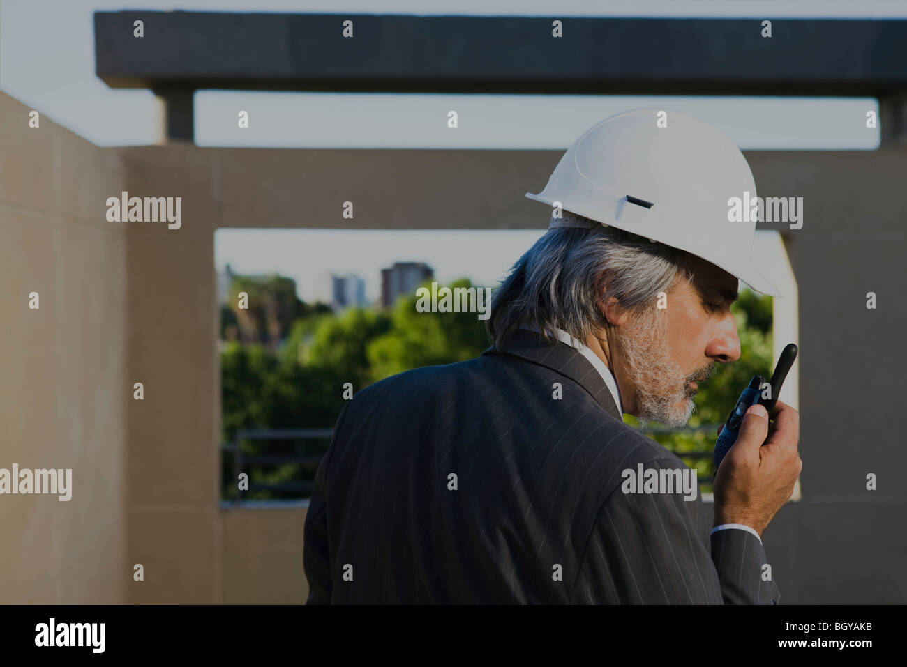 Supervisors discussing construction site hi-res stock photography and ...