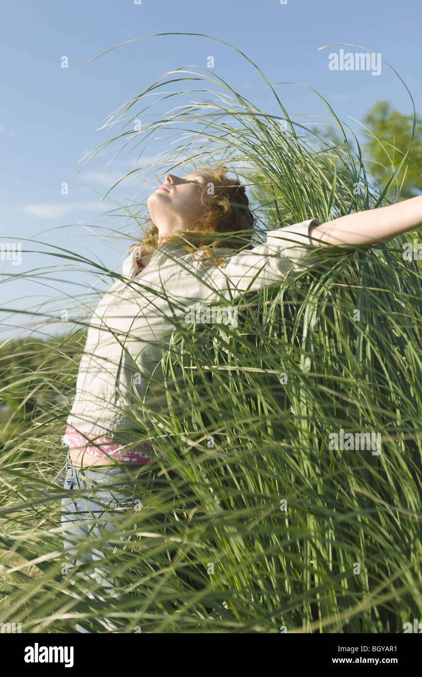 Back view standing young redhead hi-res stock photography and images ...