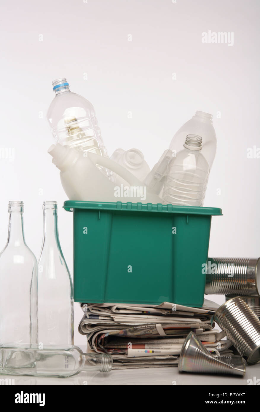 Bottles tins plastic and newspapers in a plastic container Stock Photo ...
