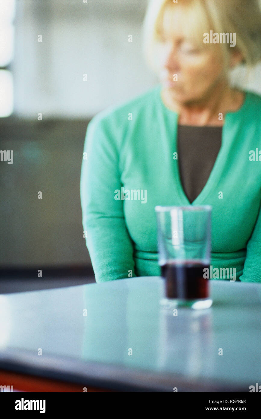Seated lady table hi-res stock photography and images - Alamy