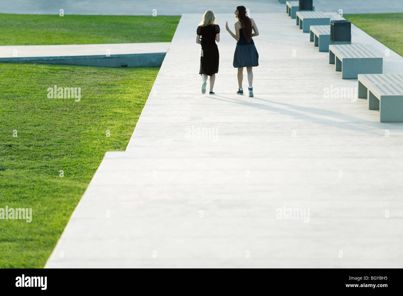 Two people walking together from above hi-res stock photography and ...