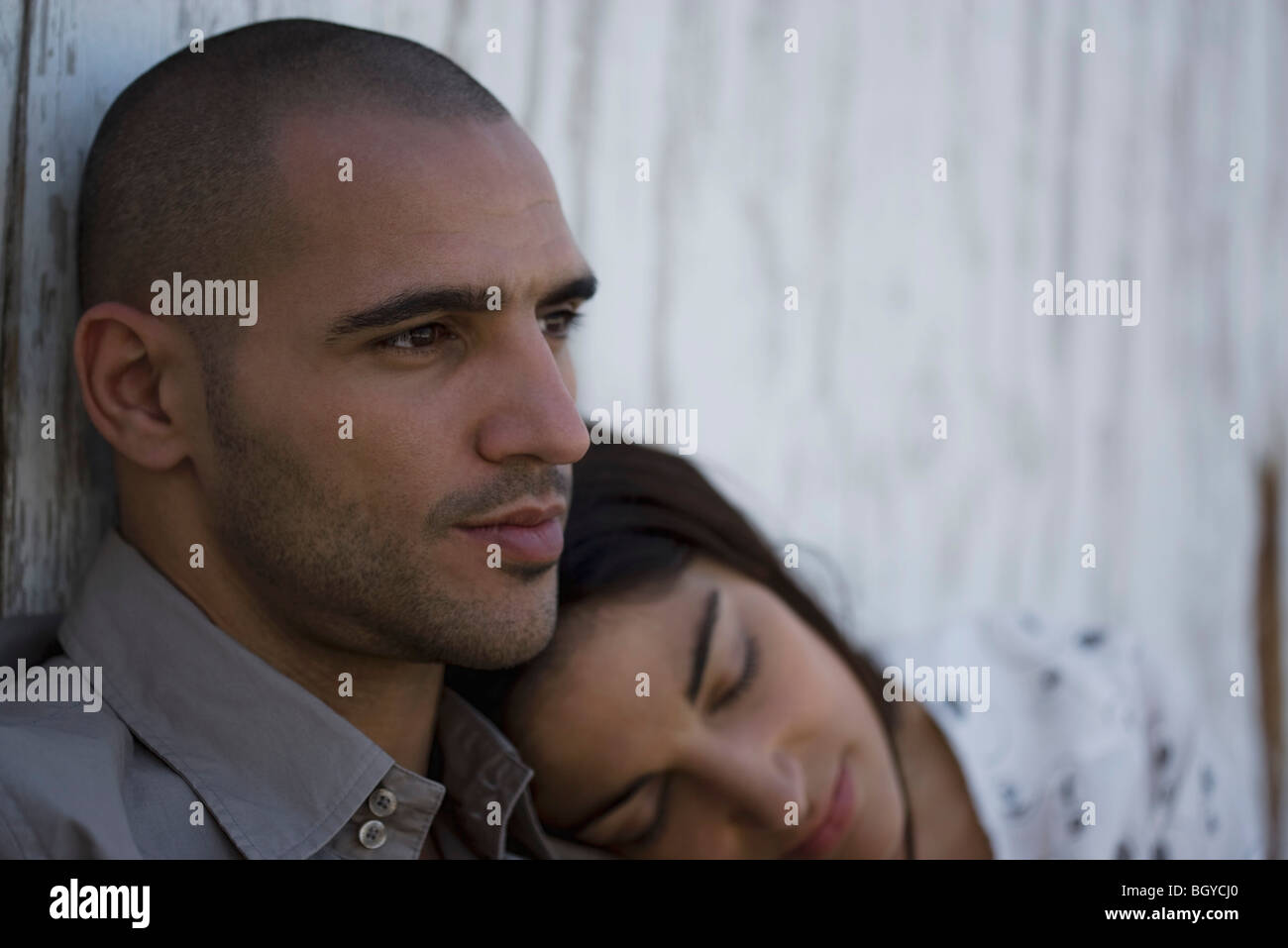 Woman resting head on mans shoulder hi-res stock photography and images ...