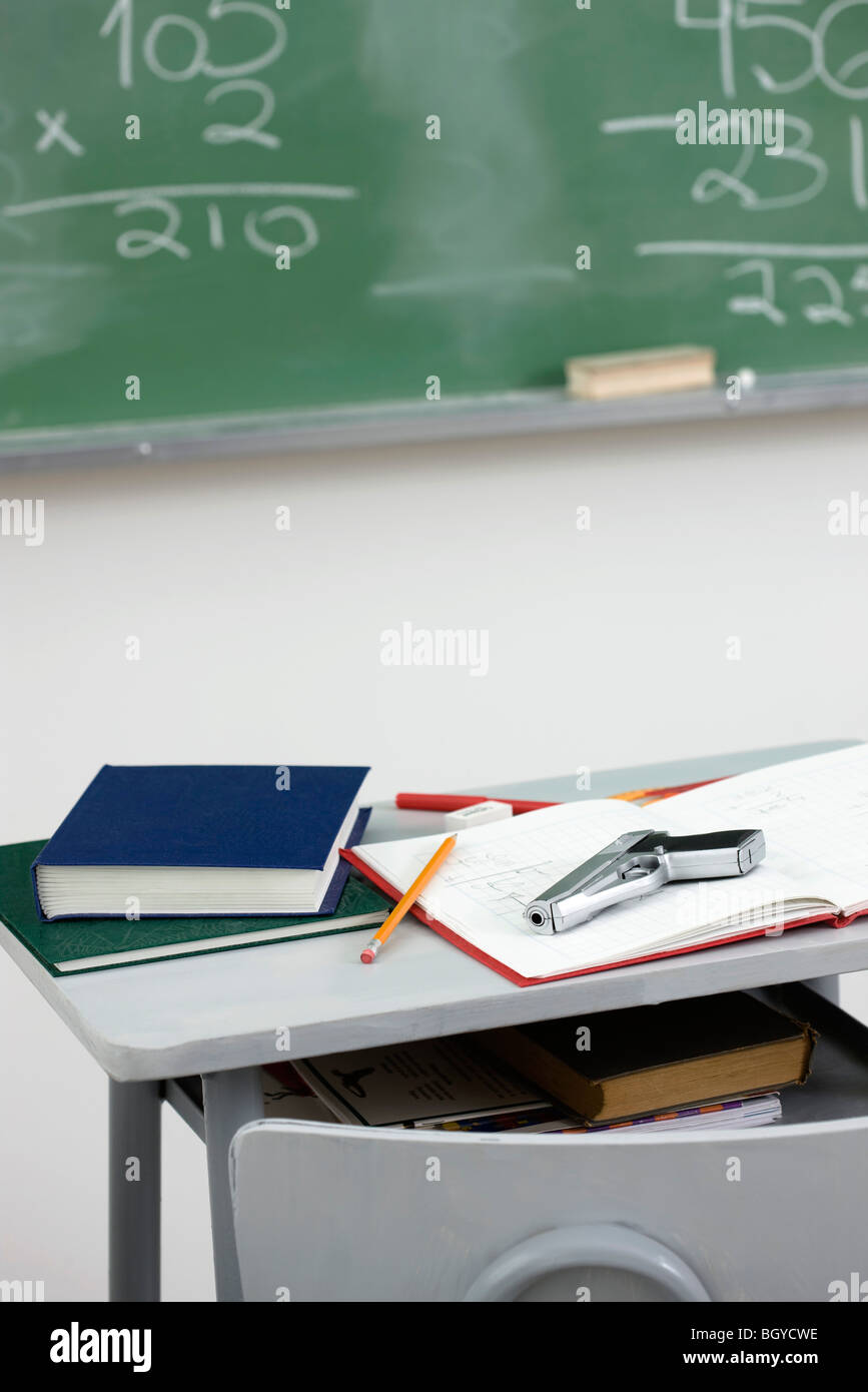 Books on desks in classroom hi-res stock photography and images - Alamy