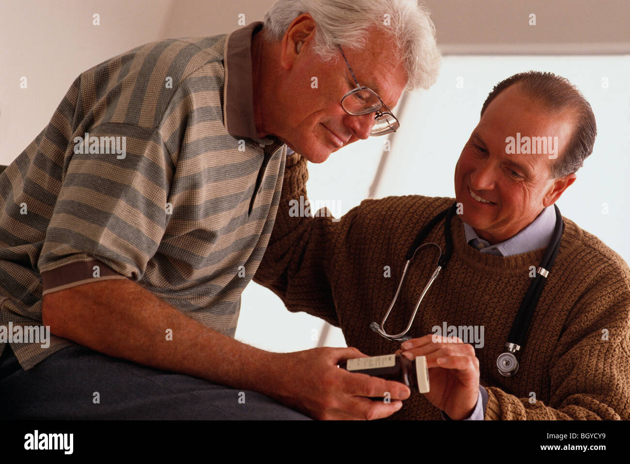 Doctor talking to patient Stock Photo - Alamy