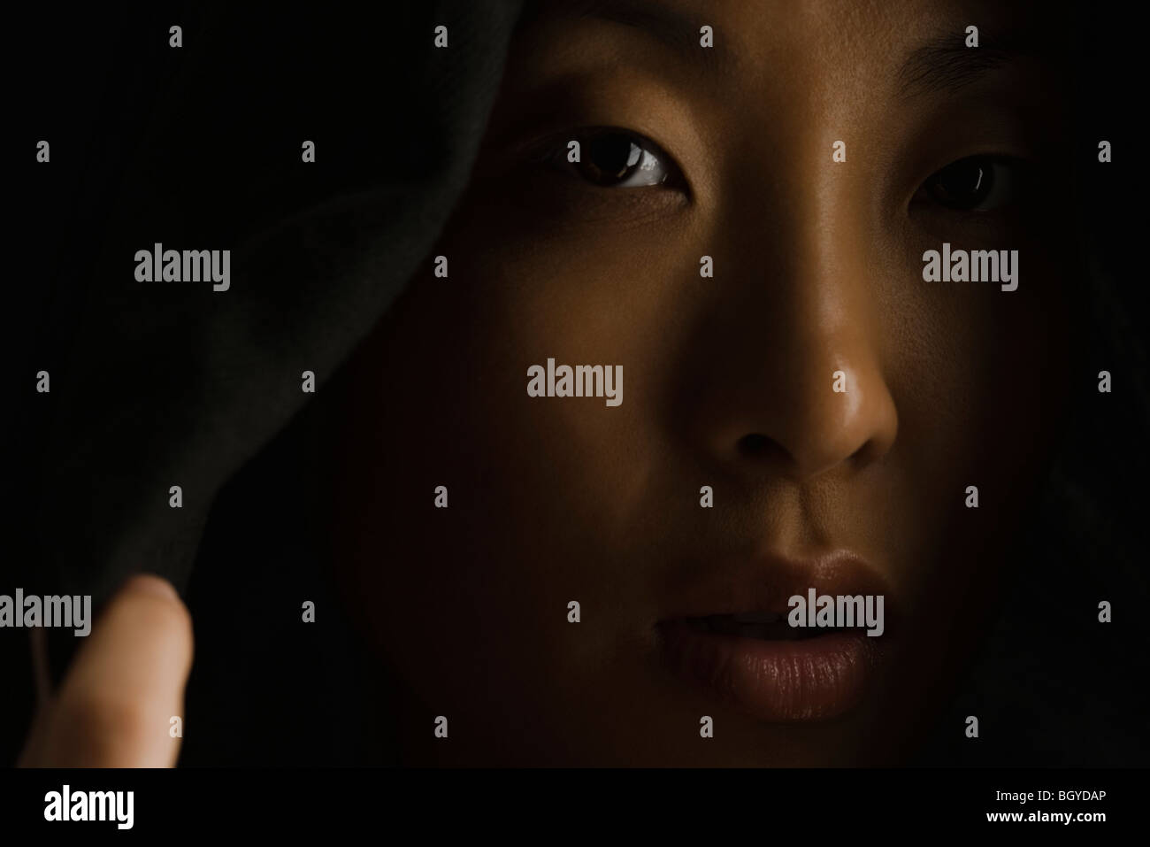 Woman hood face eyes close up hi-res stock photography and images - Alamy