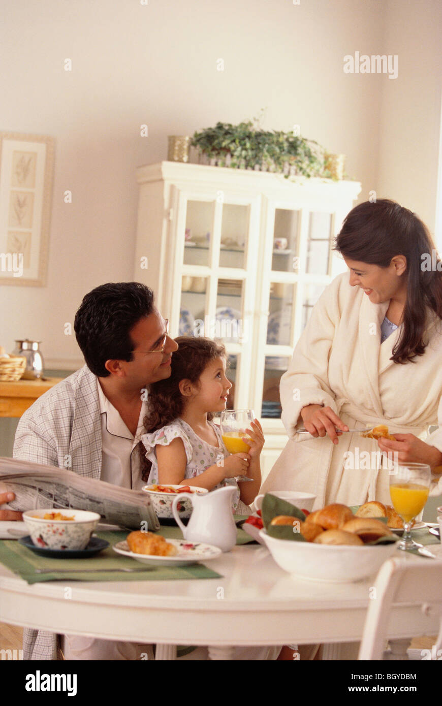 Family eating breakfast Stock Photo - Alamy