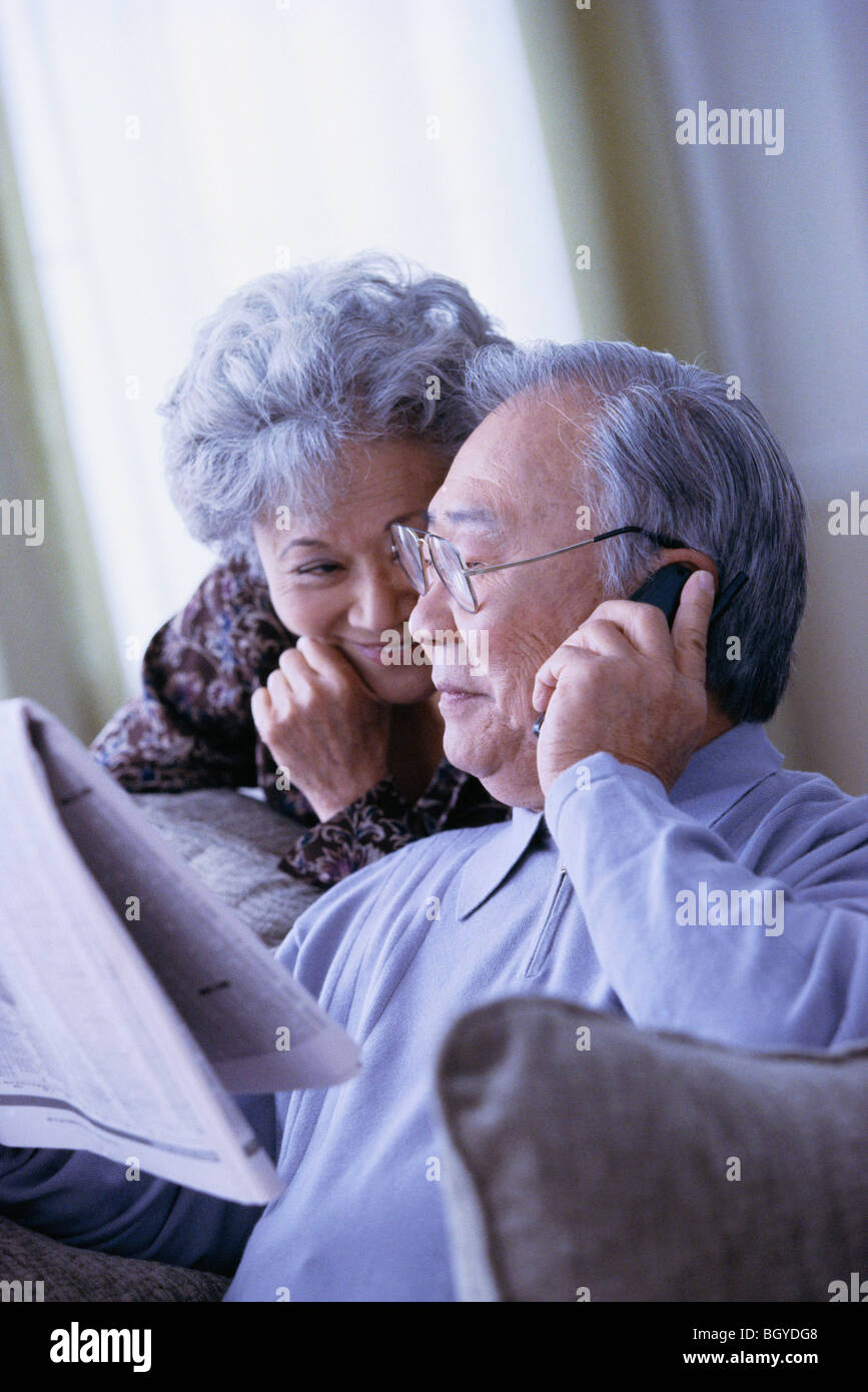 Asian senior couple reading news hi-res stock photography and images ...