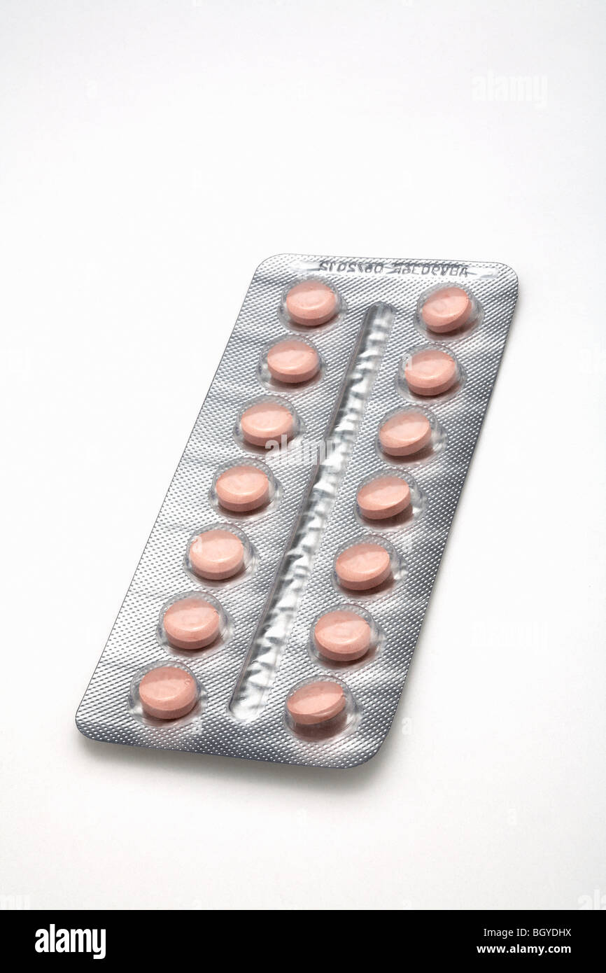 Strip of pills on white background Stock Photo - Alamy