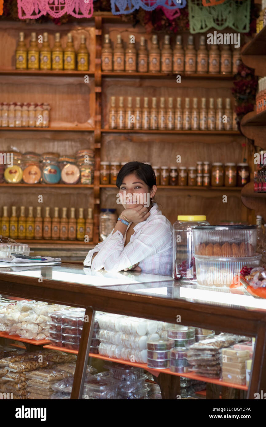 Woman at candy counter Stock Photo - Alamy