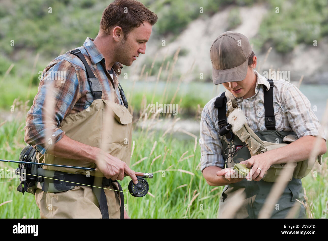 Two anglers talking hi-res stock photography and images - Alamy
