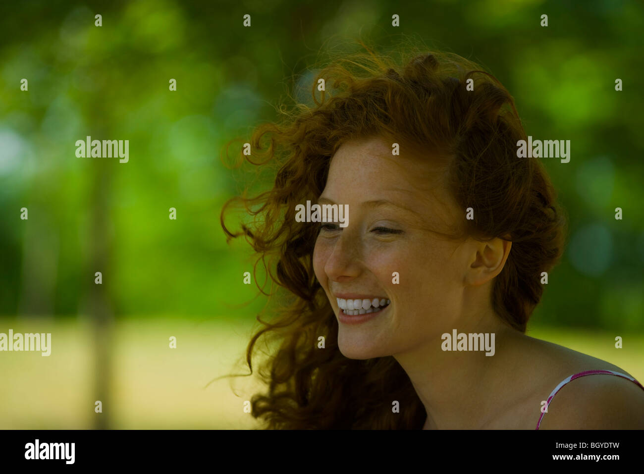 Young woman smiling, portrait Stock Photo - Alamy