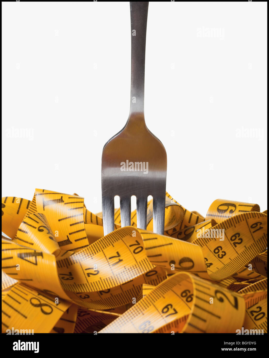Fork in measuring tape Stock Photo - Alamy