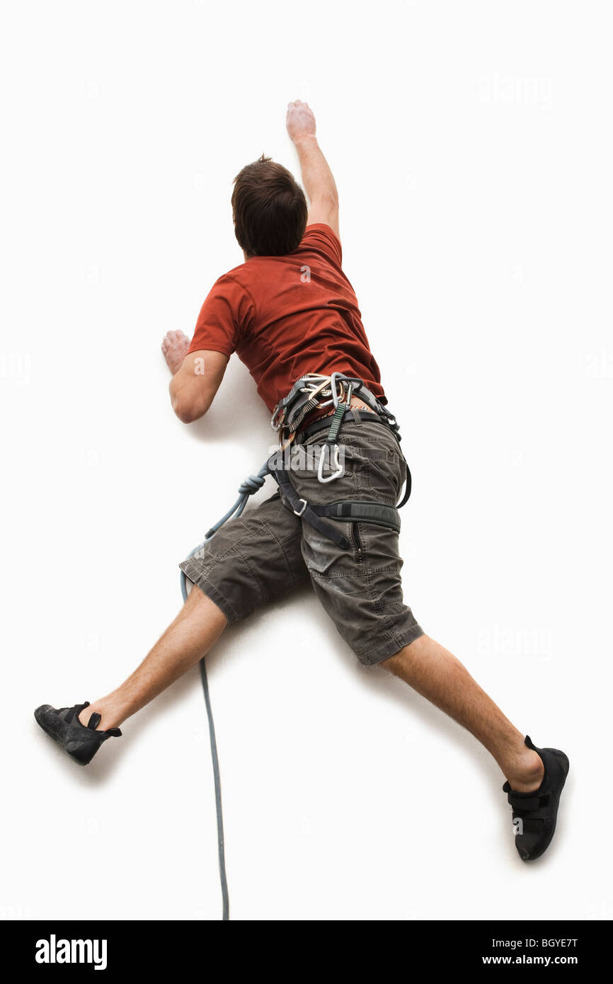 Rear view of rock climber Cut Out Stock Images & Pictures - Alamy