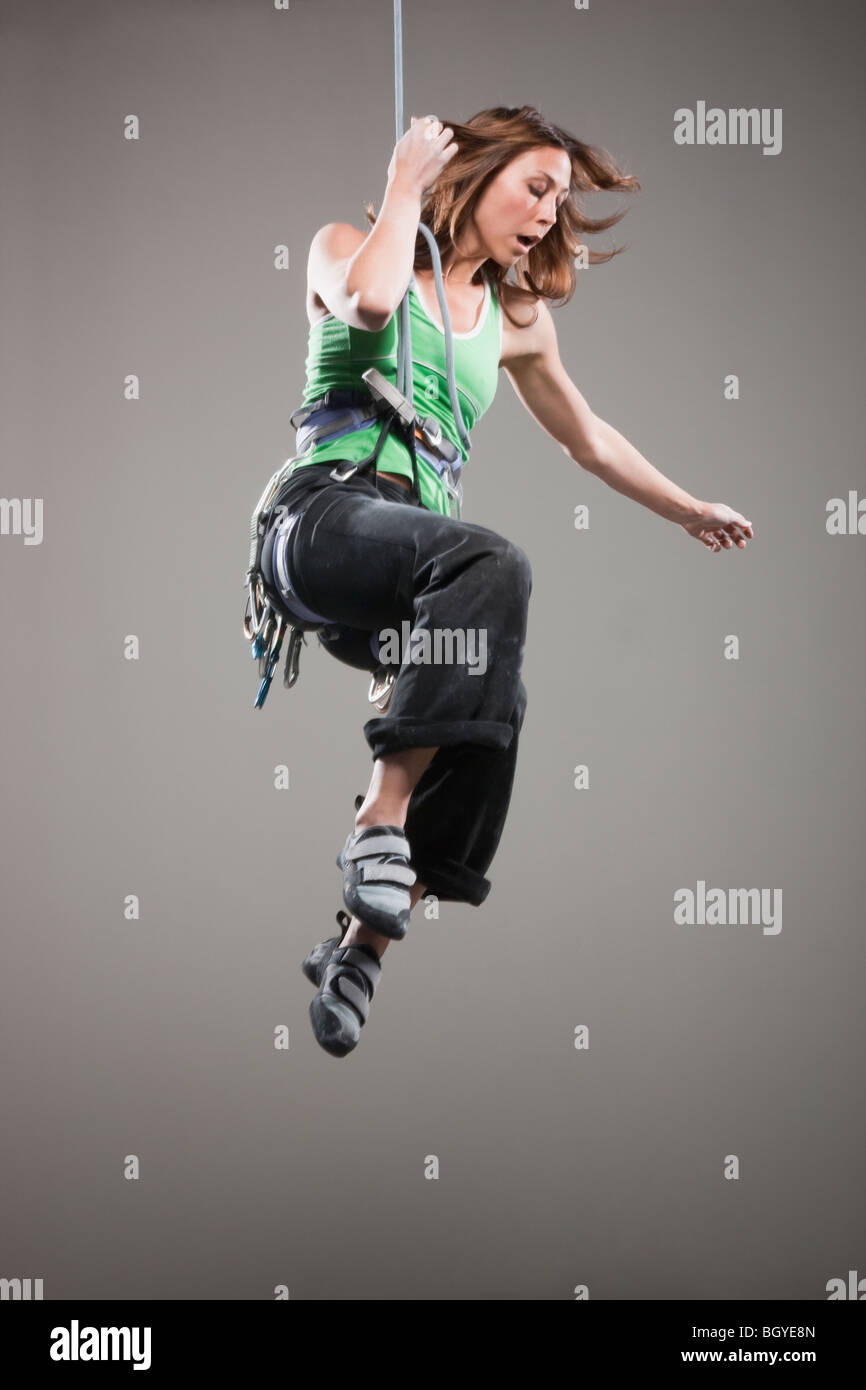 Female climber propelling Stock Photo - Alamy