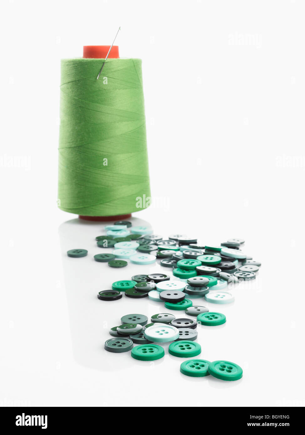 Thread and buttons Stock Photo - Alamy