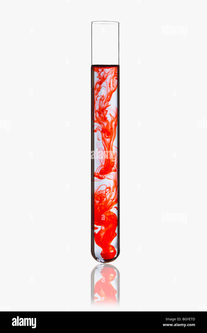 Red mixture in beaker Stock Photo - Alamy