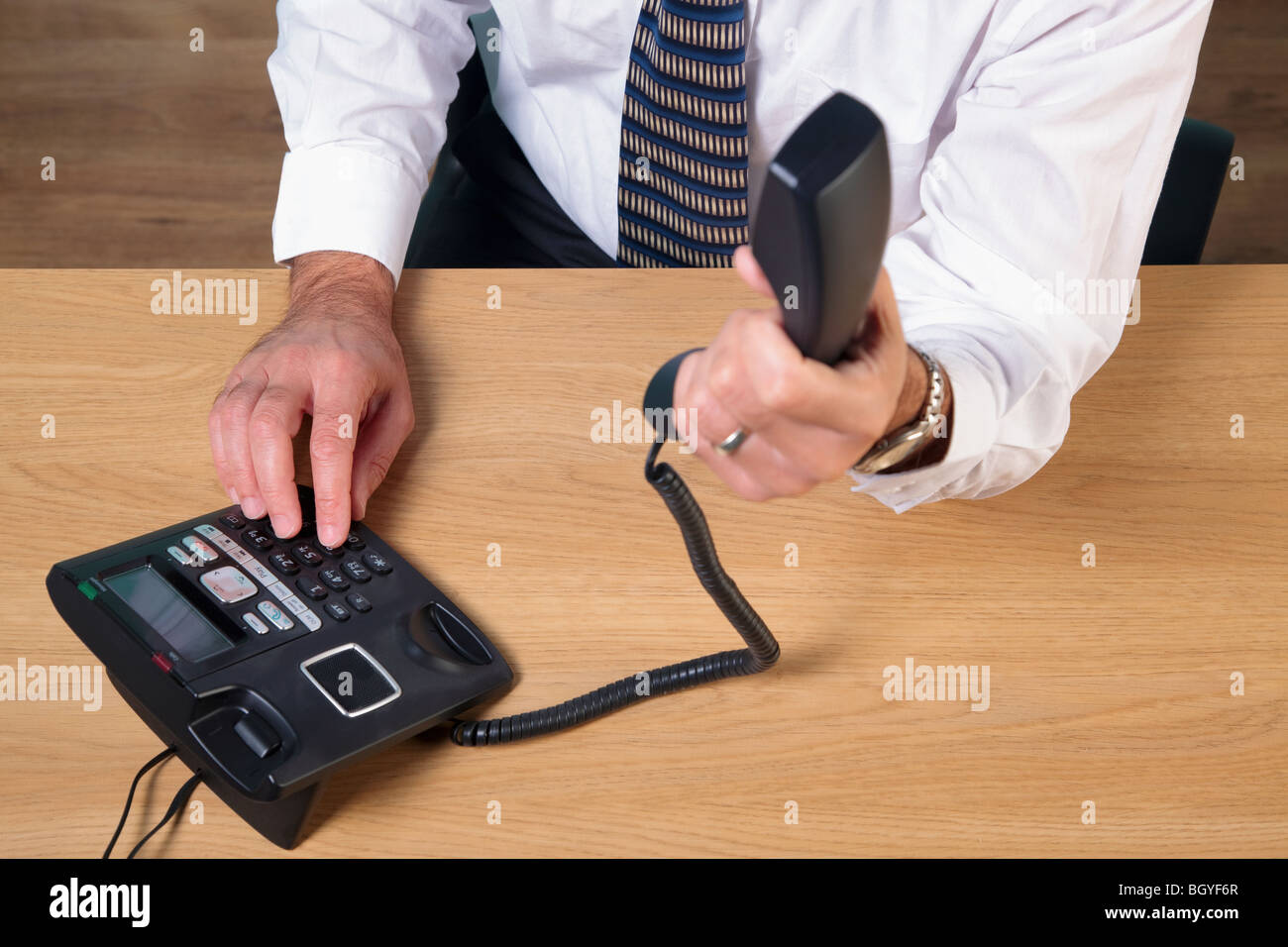 Man dialing phone Stock Photo - Alamy