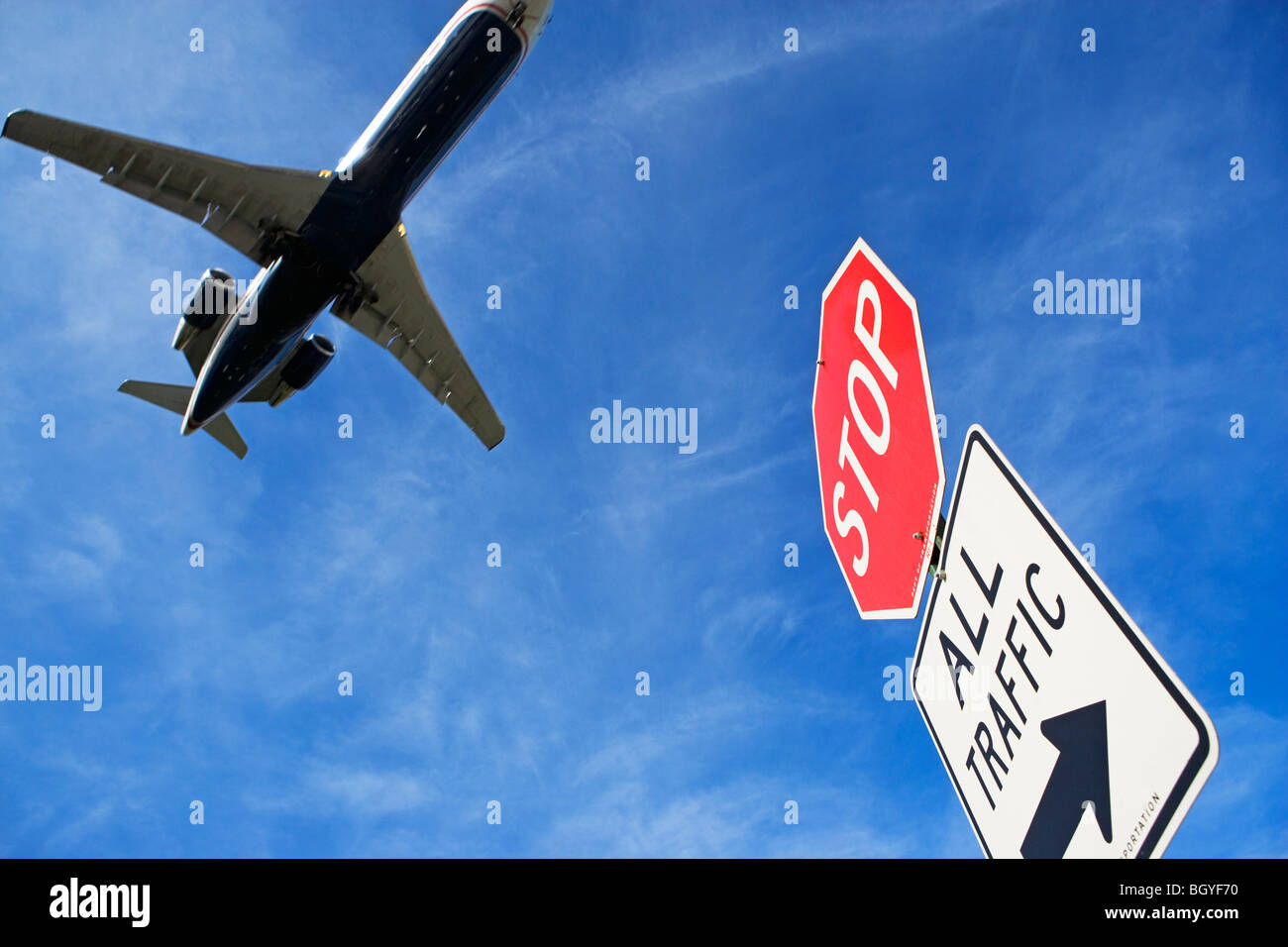 Airplane and traffic sign Stock Photo - Alamy