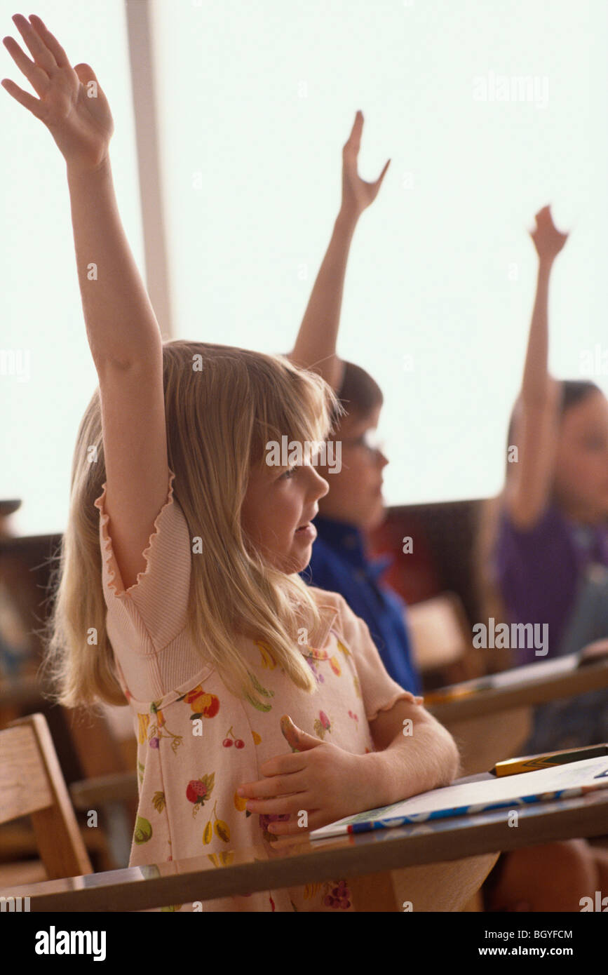 Hands up classroom hi-res stock photography and images - Alamy