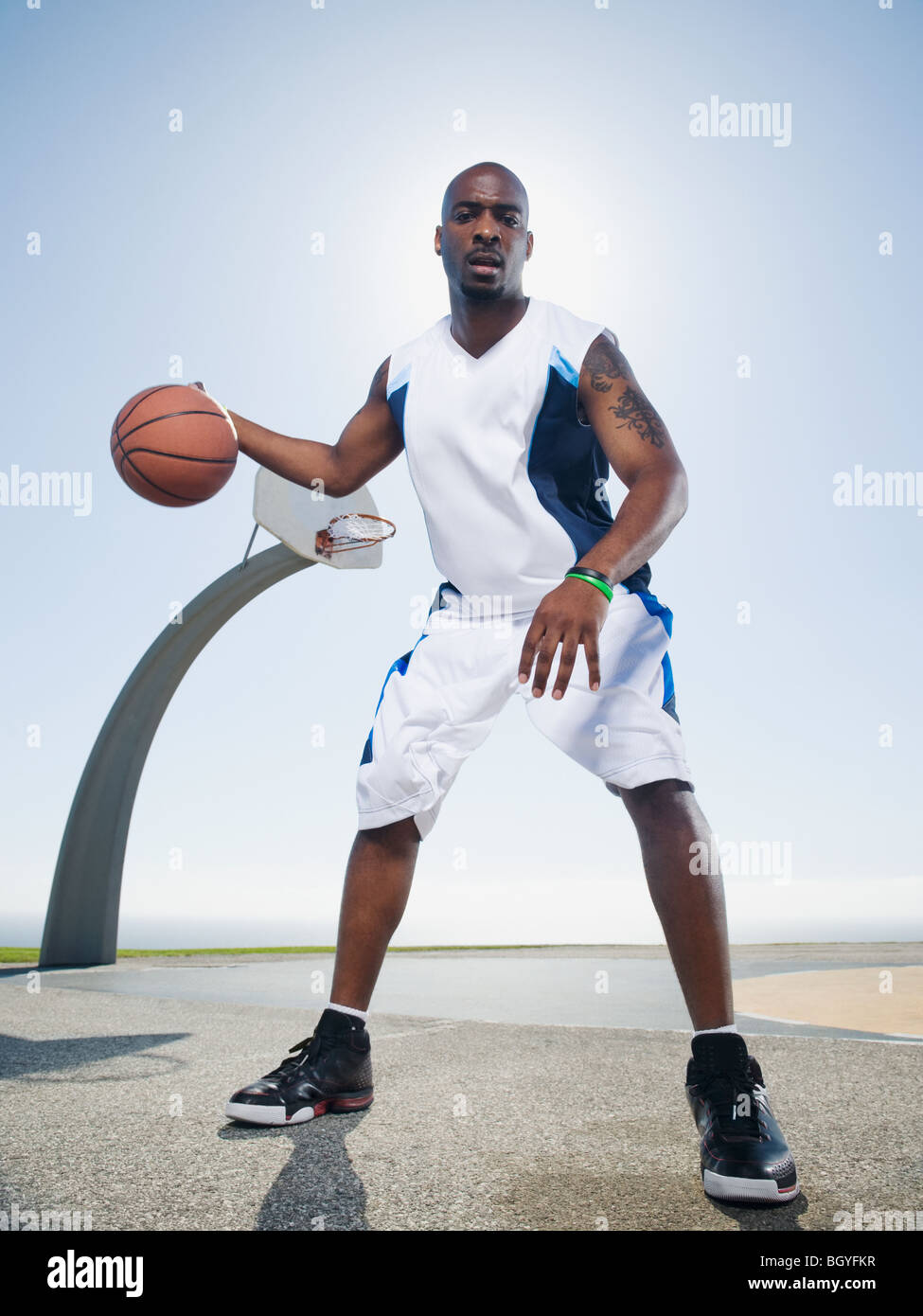 Portrait basketball player dribbling ball hi-res stock photography and ...