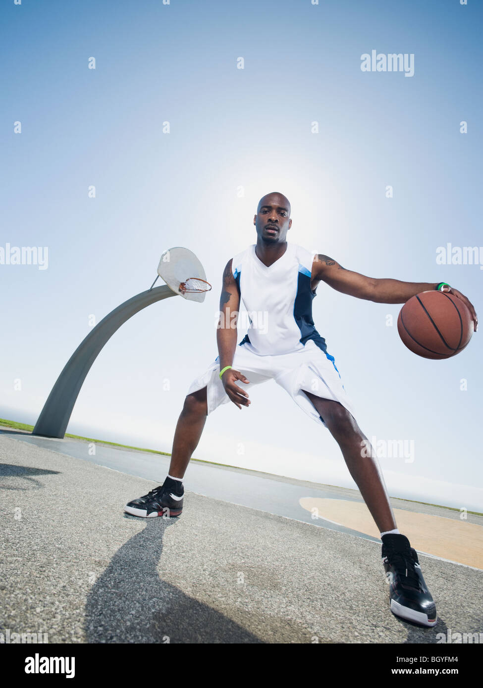 Portrait basketball player dribbling ball hi-res stock photography and ...