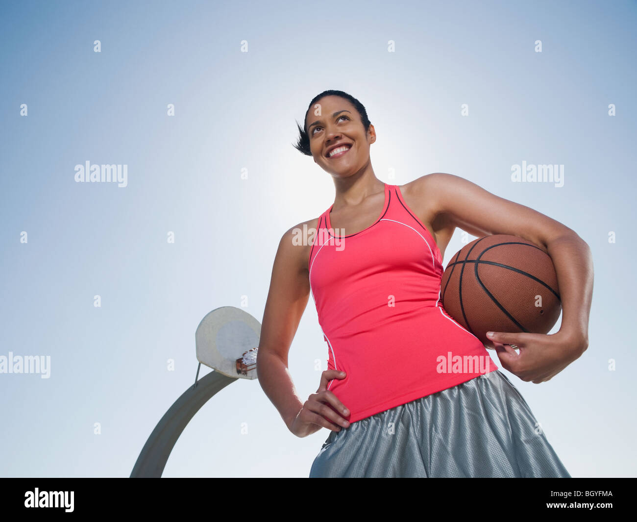 Woman holding basketball net in hi-res stock photography and images - Alamy