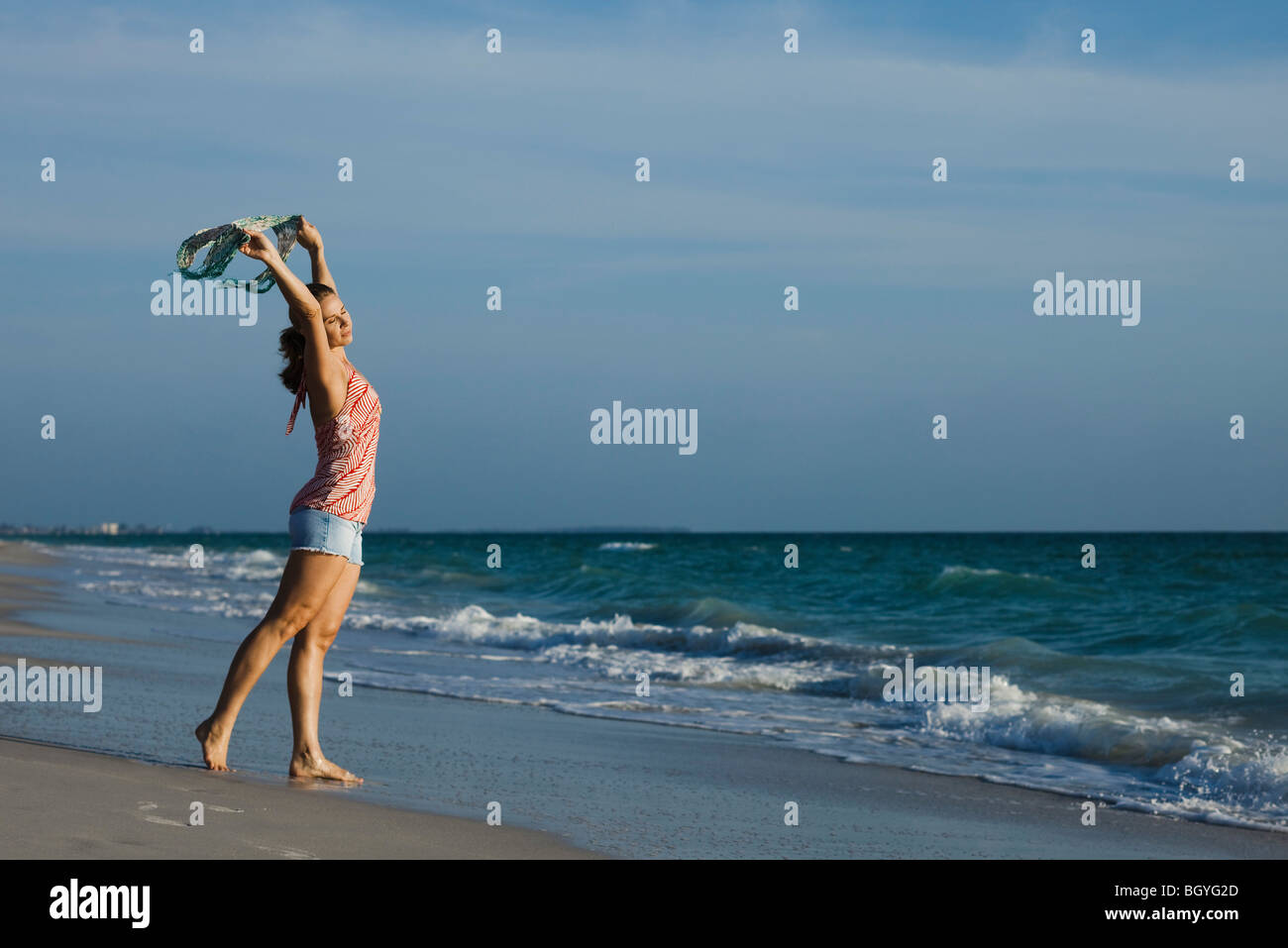 Beach woman over dressed hi-res stock photography and images - Alamy