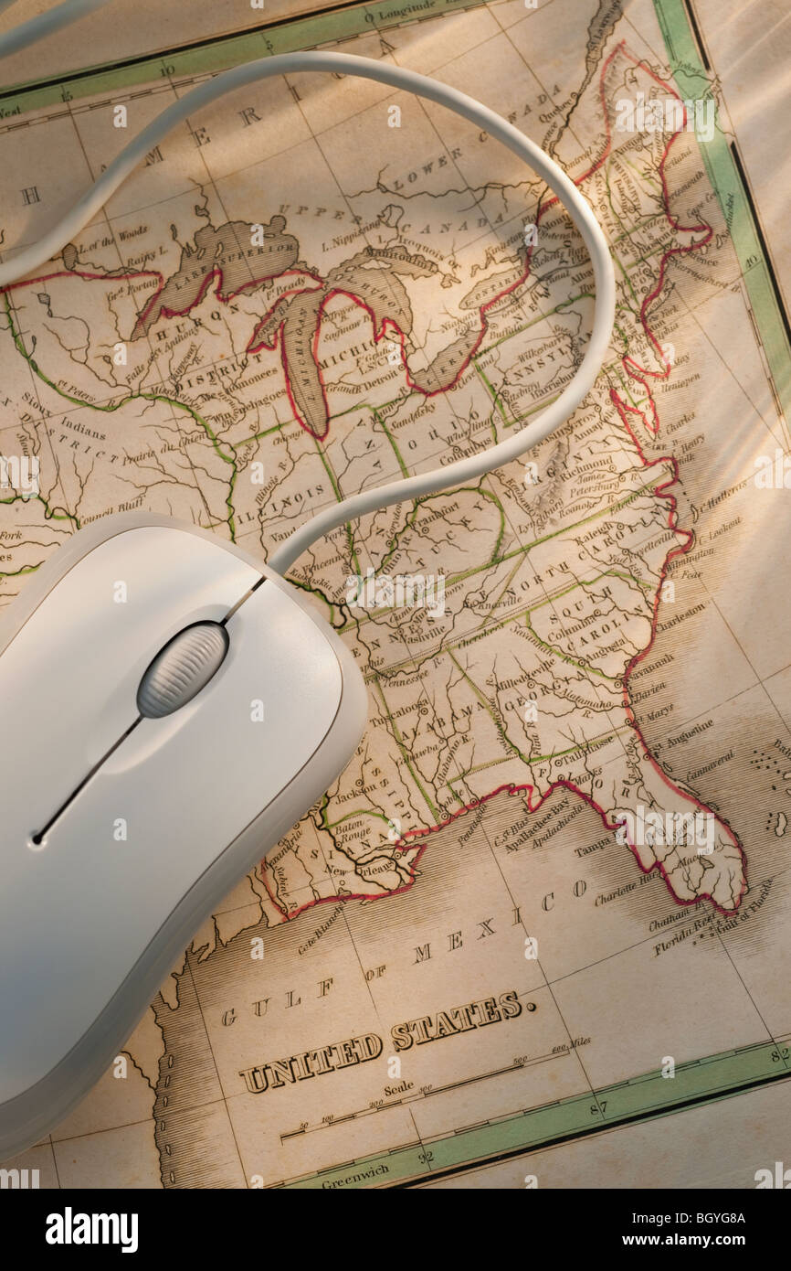 Antique map and computer mouse Stock Photo - Alamy