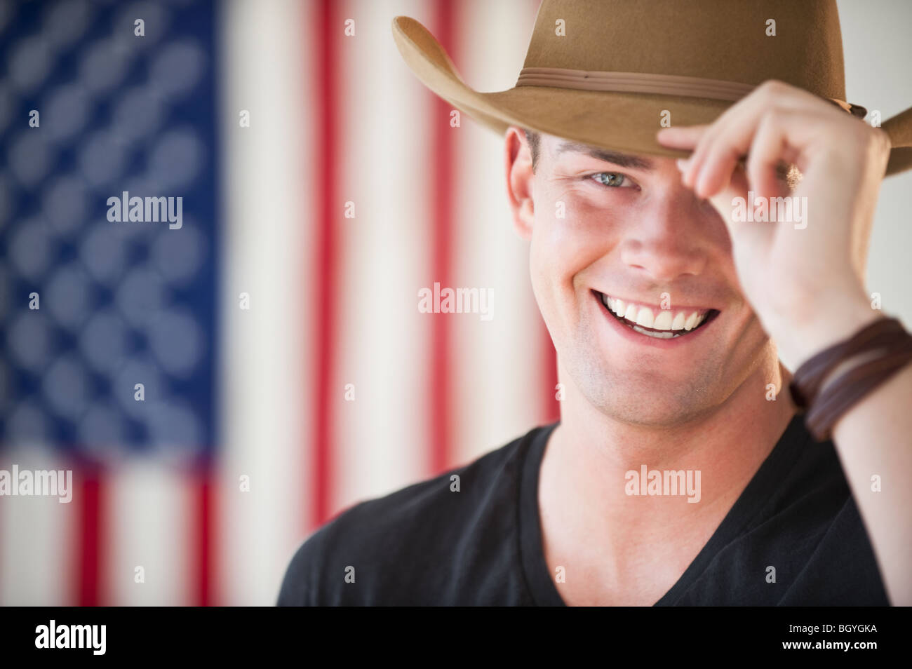 Laughing man cowboy hat hi-res stock photography and images - Alamy