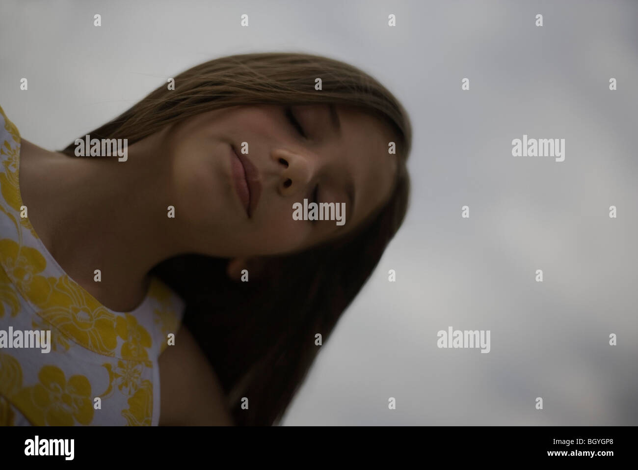 Female with head tilted, eyes closed Stock Photo - Alamy