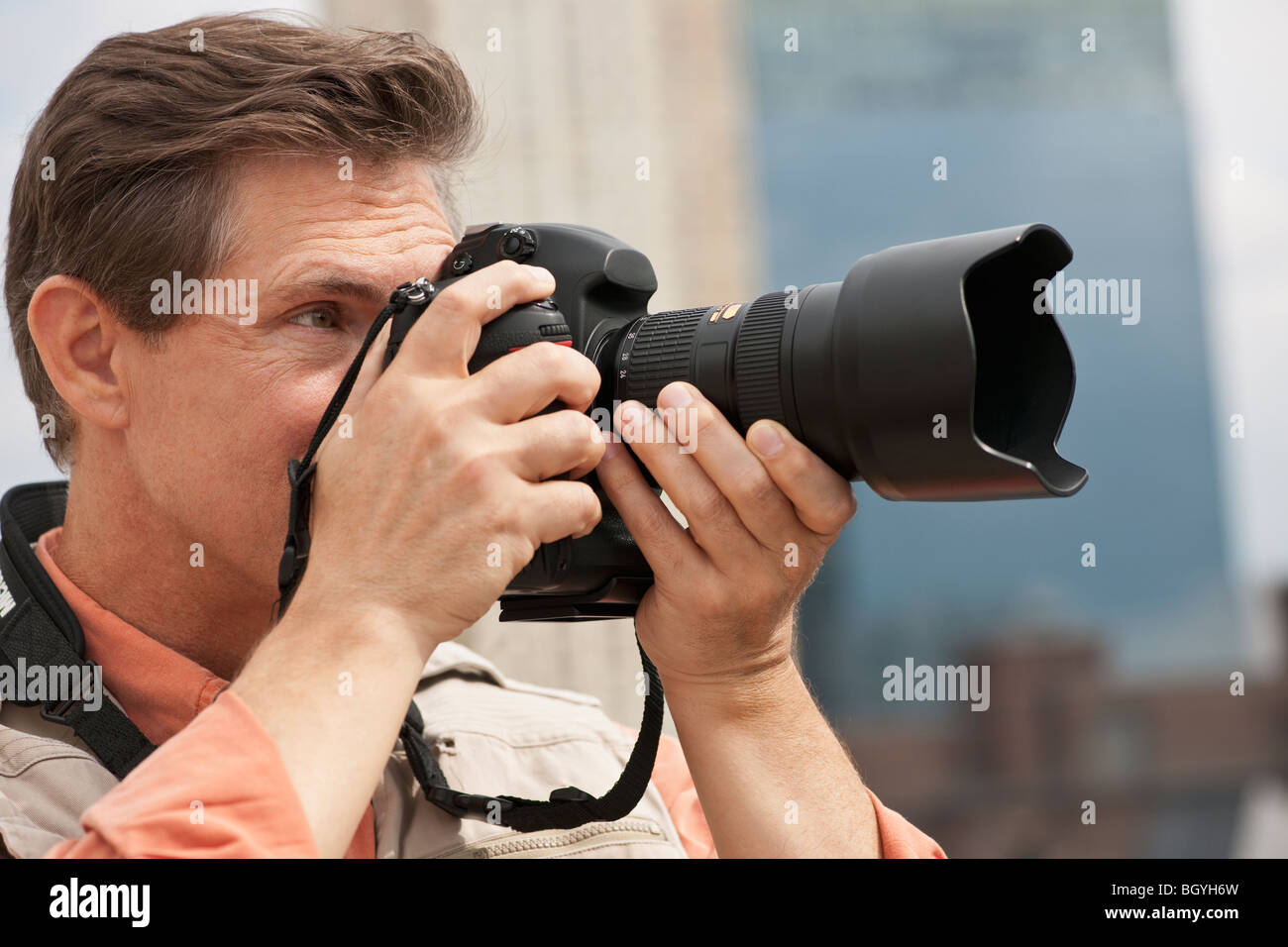 Man taking picture Stock Photo - Alamy