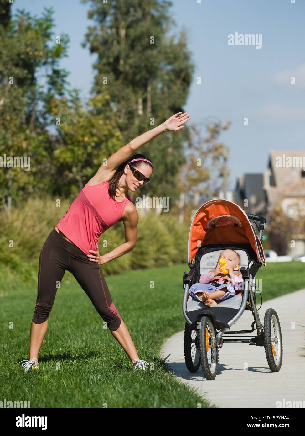 Jogger and baby Stock Photo - Alamy