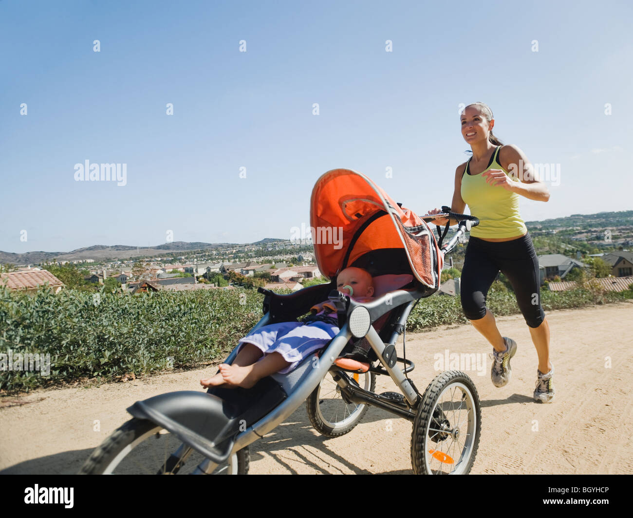 Mom pushing stroller city hi-res stock photography and images - Alamy
