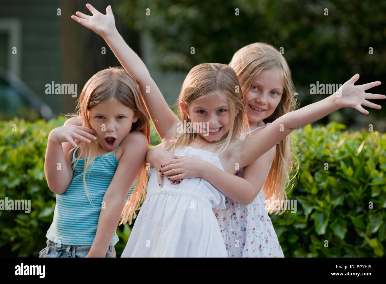 Three young girls Stock Photo - Alamy