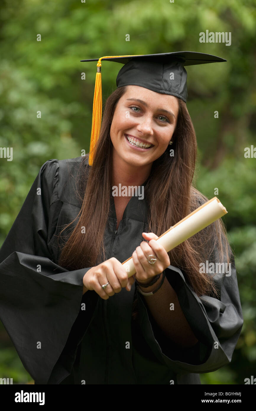 Graduate with diploma Stock Photo - Alamy