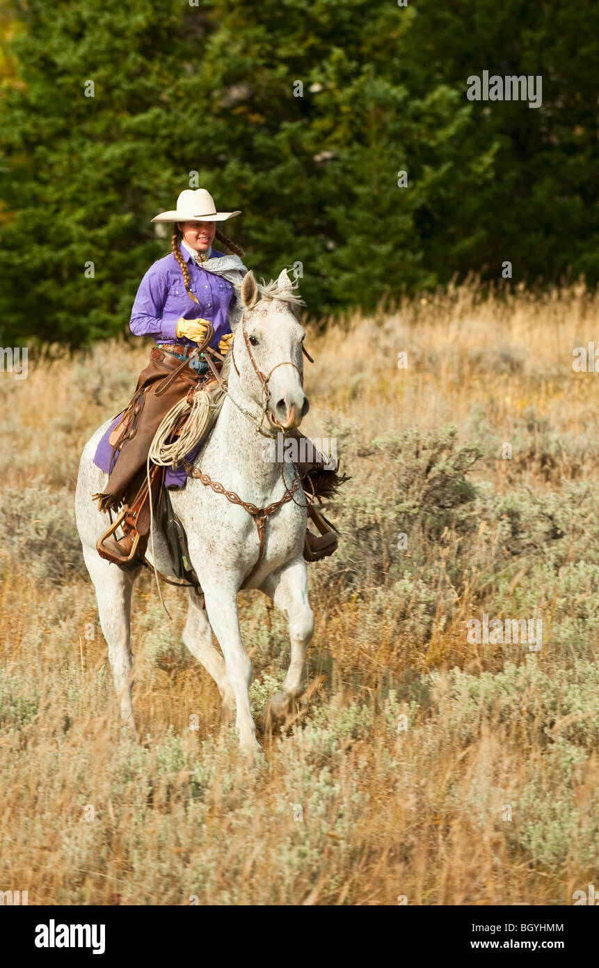Cowgirl, horse, western, walking hi-res stock photography and images ...