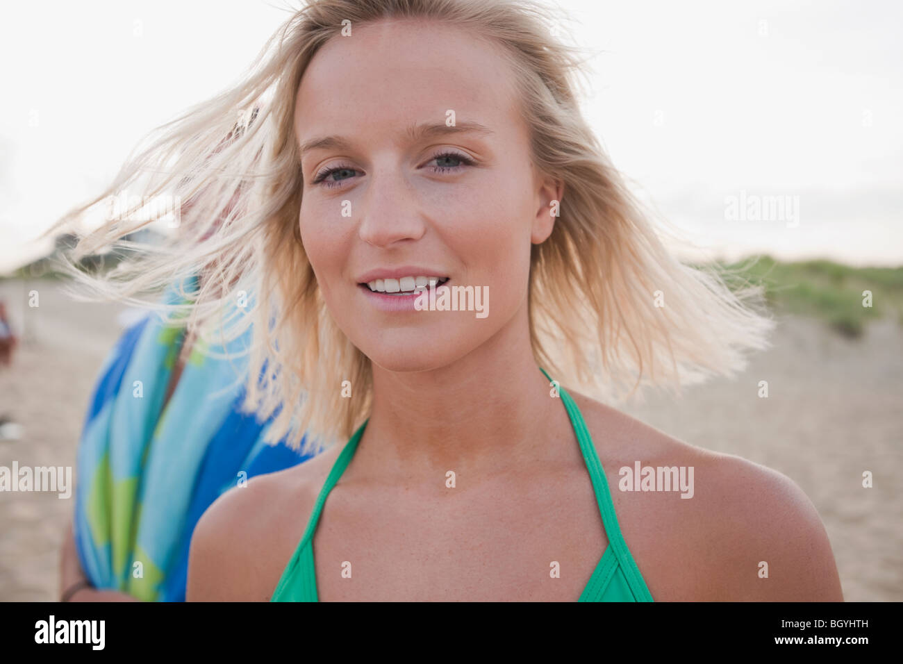 Young woman at the beach Stock Photo - Alamy