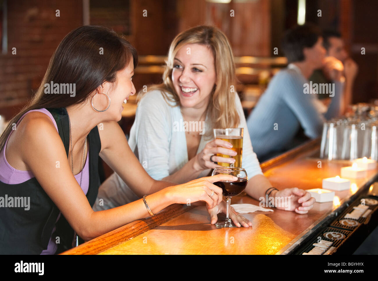 Friends drinking wine bar hi-res stock photography and images - Alamy