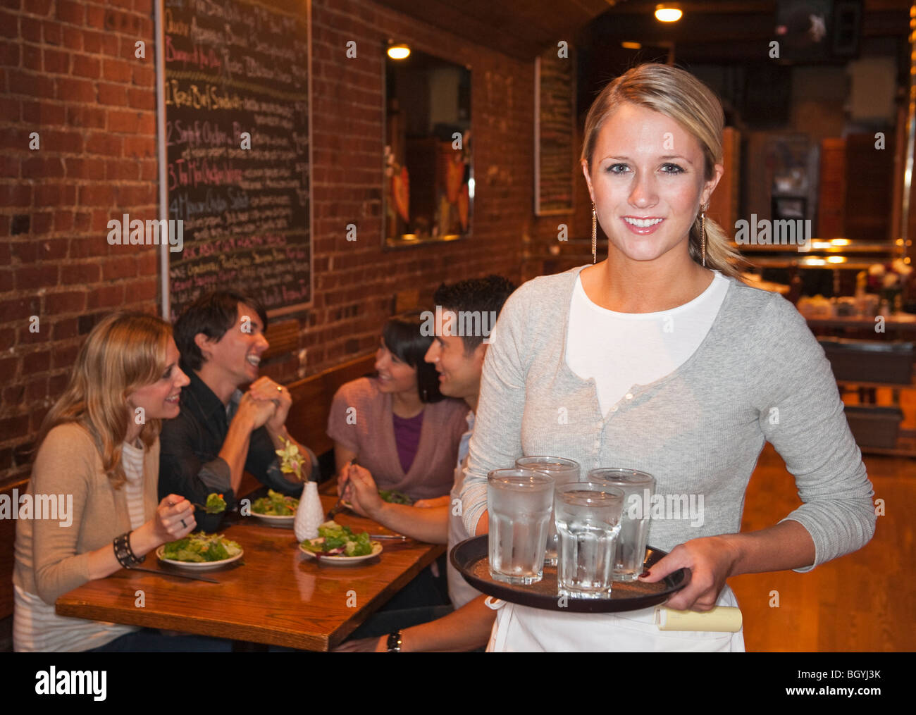 Restaurant server with tray hi-res stock photography and images - Alamy