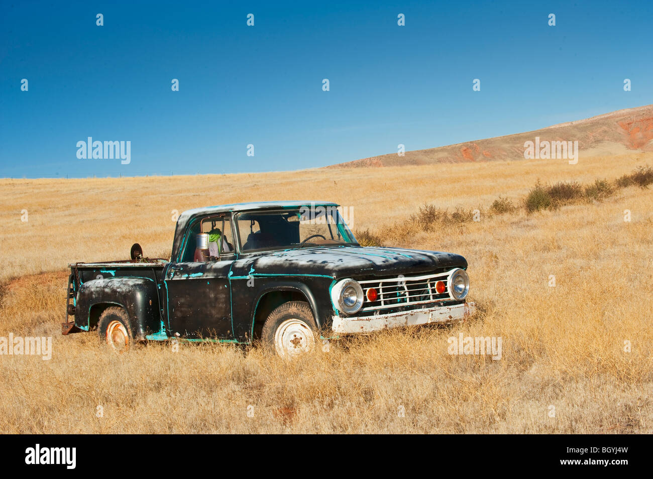 Truck in field Stock Photo - Alamy